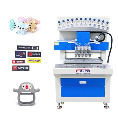 Cina Soft PVC custom rubber brooch with logo making machine in vendita