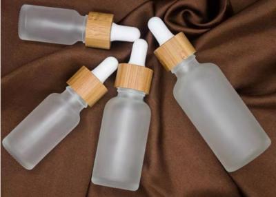 Китай Капельница круга 50ml BPA свободная неэтилированная стеклянная разливает по бутылкам с бамбуковым воротником продается