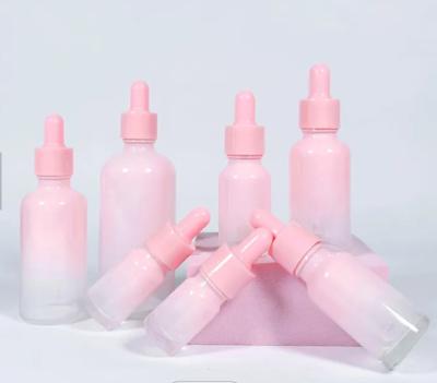 Cina Bottiglia di lusso rotonda 5ml 10ml 15ml 30ml 100m del contagoccia di occhio di vetro di rosa di pendenza del siero in vendita