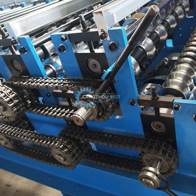 Chine Coupe hydraulique 5.5kw acier galvanisé double couche panneau de toiture profilé machine de formage de rouleau à vendre
