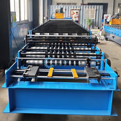 Chine Coupe hydraulique 5.5kw acier galvanisé double couche panneau de toiture profilé machine de formage de rouleau à vendre