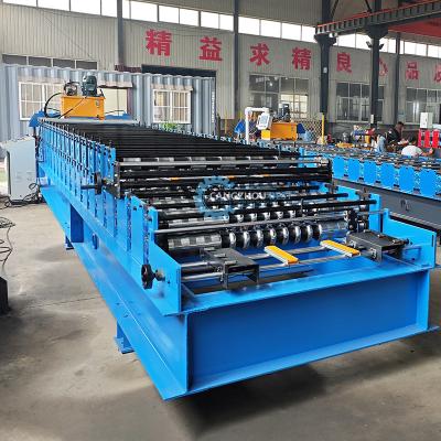 Chine Coupe hydraulique 5.5kw acier galvanisé double couche panneau de toiture profilé machine de formage de rouleau à vendre