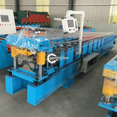 Chine Boîte de vitesse en acier Ppgi Ridge Cap Roll Forming Machine de bureau à cylindre de profil à vendre
