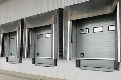 China Sistema de carga fijo ajustable Refugio de la puerta del muelle con revestimiento de acero galvanizado y tejido resistente al desgaste fijo en venta