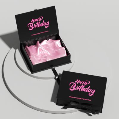 China Luxury Custom Black Foldable Magnetic Cardboard Gift Box Art Paper UV Coating Matt Lamination for Clothing Paper Gift Packing for sale