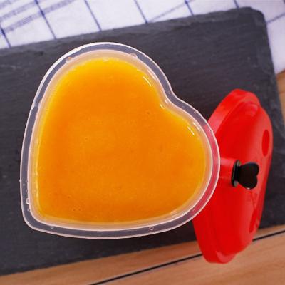 Cina Wholesale Heart shape 500ml PP transparent disposable milk tea boba tea plastic cup with lid in vendita