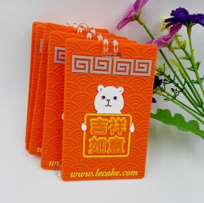 China Las etiquetas del equipaje del silicón/el hotel anaranjados de moda del viaje marca con etiqueta para el regalo del anuncio en venta