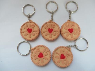 China Llaveros lindos promocionales del PVC de la goma de silicona de las galletas del chocolate con el anillo del metal, el mejor regalo de la Navidad en venta