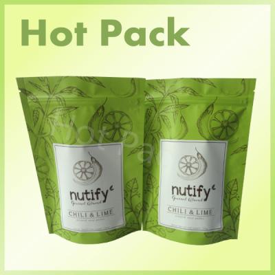 Cina La stampa a chiusura lampo del peperoncino rosso/calce di Nutify sta sulle borse con colore verde in vendita