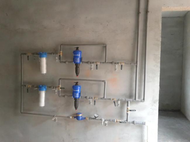 Water meter, doser and filter components