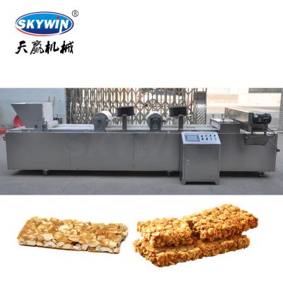 China El caramelo automático del cacahuete de la cebada que hacía la máquina 300kg/h hizo salir en venta