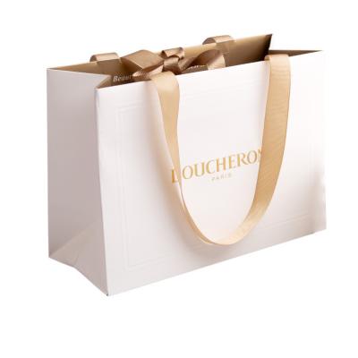 China Customized Printed Logo Eco Friendly Paper Bags Wholesale Printing Kraft Paper Bag High Quality Paper Bags With Your Own Logo for sale