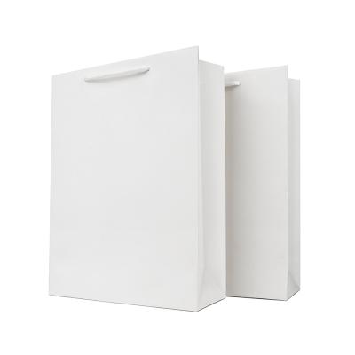 China OEM Custom Luxury Gift Craft Shopping White Kraft Paper Bag With Handle Manufacturer for sale
