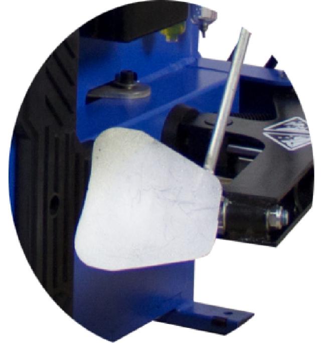 XT-209 Tire Changer front view showing blue machine with adjustable clamps