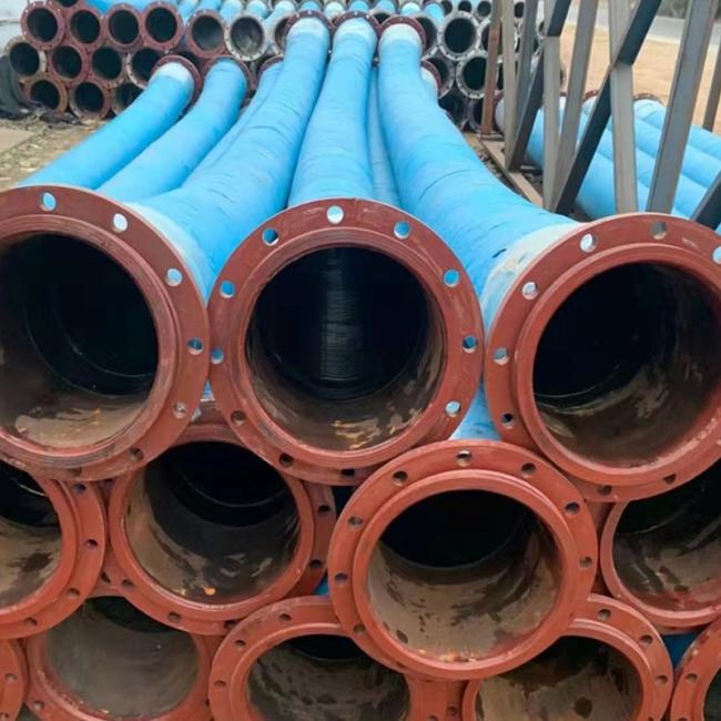 Large bore flange discharge hose installed in industrial water circulation system