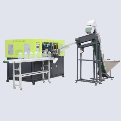 China 2000 BPH Automatische 2 holte PET waterfles blaasgietmachine met SMC roterende cilinder Te koop