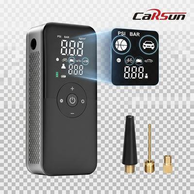 portable tire inflator in hand