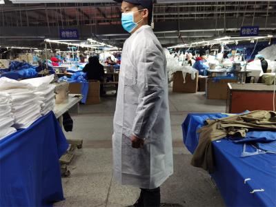 Cina Servizi standard di ispezione dei terzi di AQL per l'abito chirurgico/cappotto di funzionamento in vendita