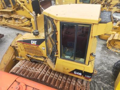 Chine Bouteur utilisé de Caterpillar D4g en condition de travail terrible avec le prix raisonnable. Chat d'occasion D3c, D3g, bouteur de D4c en vente plus une garantie d'an. à vendre