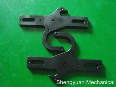 Cina Fermo del portello di caricamento dei pezzi meccanici di precisione di CNC Al6061 con il nero anodizzato in vendita