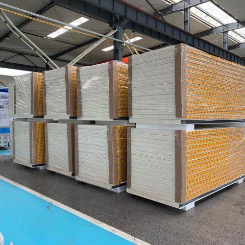 Shipping containers loaded with steel structures for international delivery