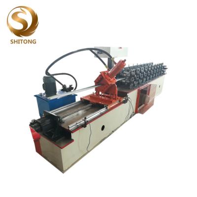 Chine Petit pain en acier d'angle de profil de panneau de haute qualité de toit formant la machine à vendre