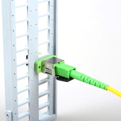 China Adaptador SC APC UPC con brida y obturador automático para carcasa metálica en venta