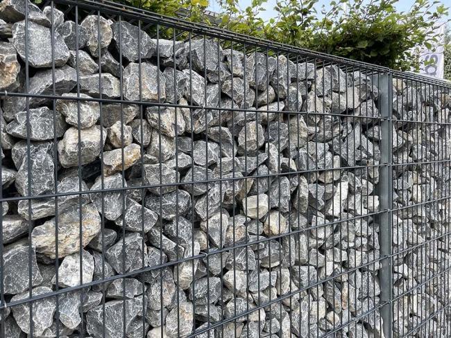 Gabion fence in landscape setting