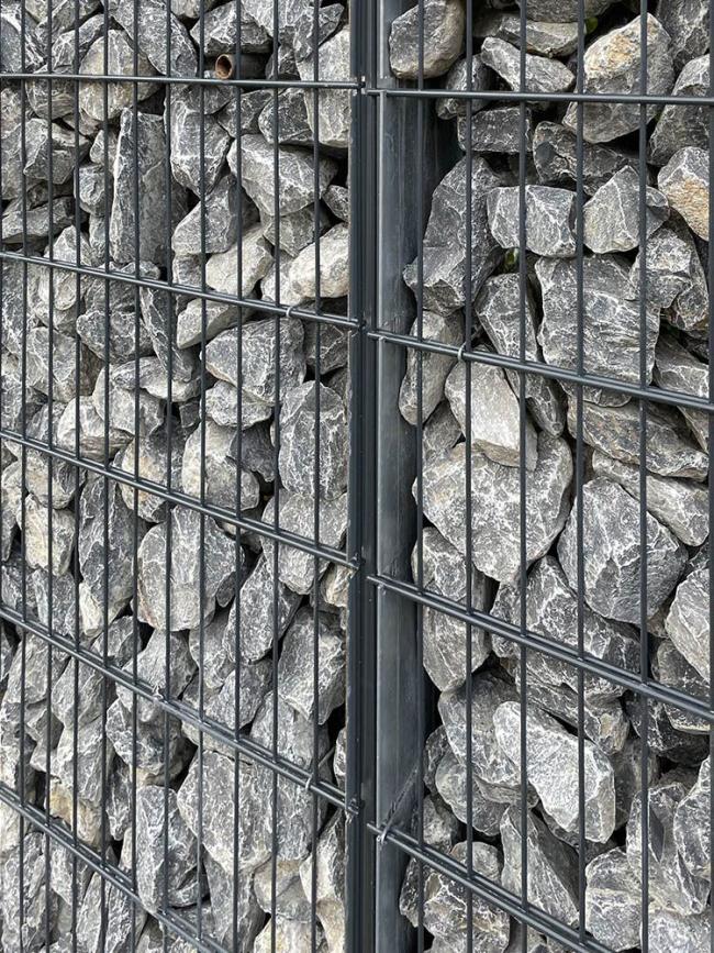 Completed gabion fence project