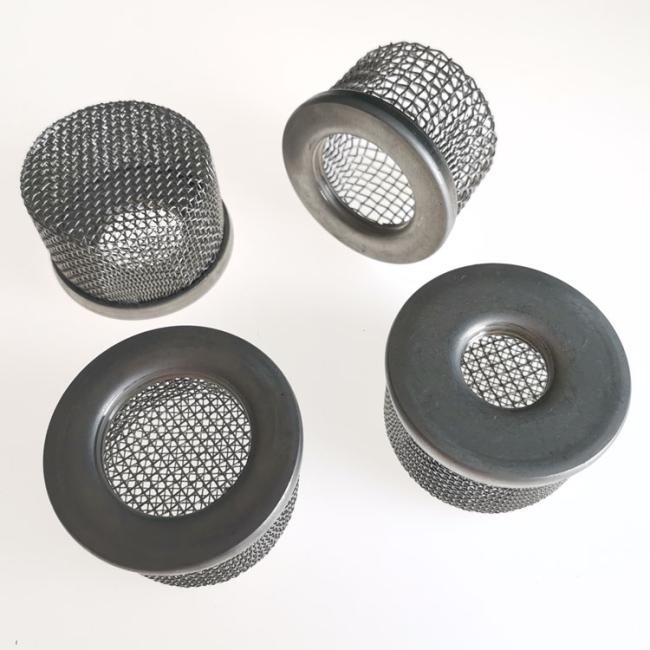 Stainless steel filter disc showing multi-layer filter cartridge construction
