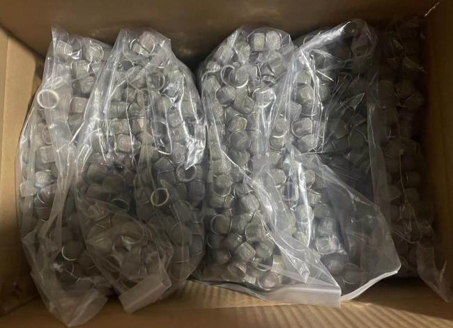 Stainless steel filter discs stacked and ready for shipment