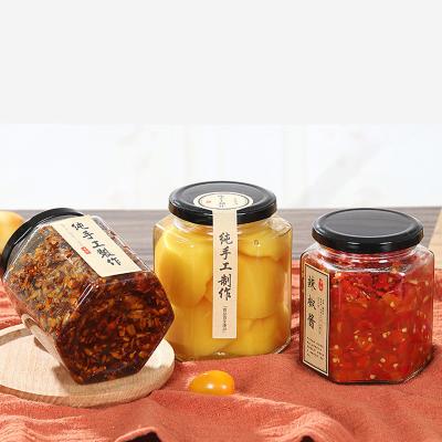 Cina Barattoli di vetro a forma di esagonali di stoccaggio del coperchio a vite, inceppamento Honey Jars di vetro della spezia in vendita