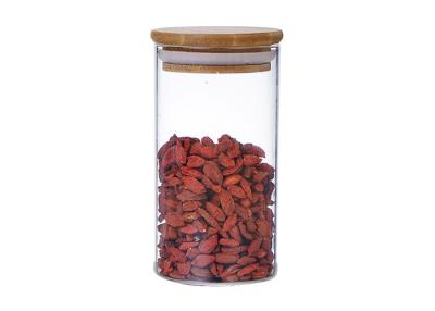 Cina Lo stoccaggio di vetro ermetico dell'alimento stona la forma rotonda Logo With Screw Wood Lid su misura in vendita