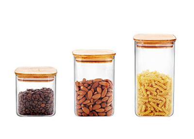 Cina Il vetro vuoto del borosilicato stona i grandi contenitori di stoccaggio di vetro dell'alimento con i coperchi di bambù ermetici 1000ml in vendita