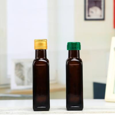 Cina Copertura di Olive Oil Bottle With Plastic di vetro del quadrato 100ml Brown in vendita