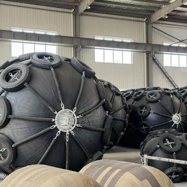 Pneumatic rubber fender installation at LNG terminal