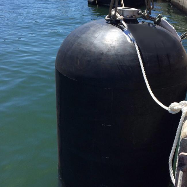 Close-up view of submarine fender rubber surface showing vulcanized construction and texture
