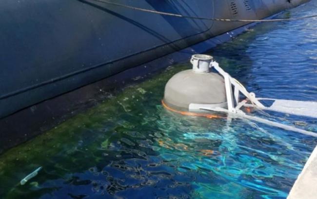 Close-up view of submarine rubber fender contact surface and mounting arrangement