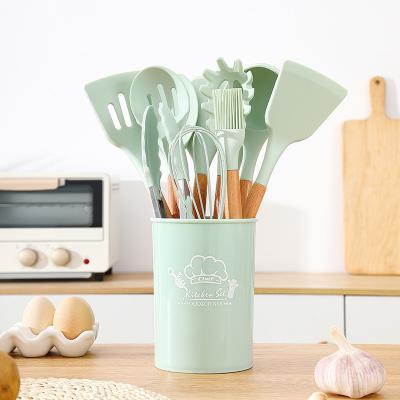 Chine Un ensemble d'outils de cuisine durable avec une spatule en silicone antiadhésif et une poignée en bois à vendre