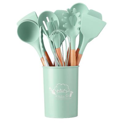 Chine Un ensemble d'outils de cuisine durable avec une spatule en silicone antiadhésif et une poignée en bois à vendre