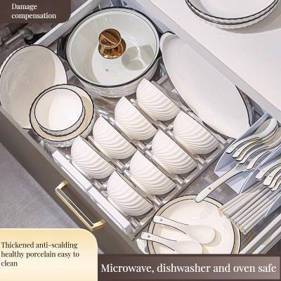 Chine Vaisselle d'hôtel de restaurant en porcelaine blanche avec bord noir et cuillères à soupe à vendre