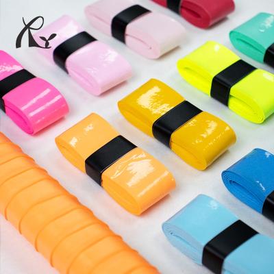 China Custom Anti-Slip Super Tacky Grip Leather Badminton & Pickleball Racket Grips Durable Embossed PU Leather Wrap Tape for sale