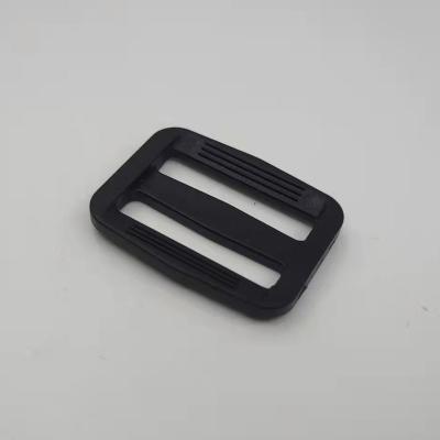 China Kundenspezifische Plastik- Verschluss-Schnalle 1 des Logo-24.7mm bewegen Plastik-Triglides-Dias Schritt für Schritt fort zu verkaufen