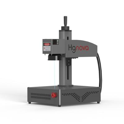China Portable Desktop Fiber Laser Marking Machine 20W 30W Small Desktop Laser Engraving Machine With Max Laser Source for sale