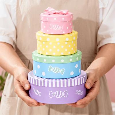 China Custom Tube Gift Boxes and Cylindrical Boxes for Cakes, Candies, Chocolates, and Candles for sale