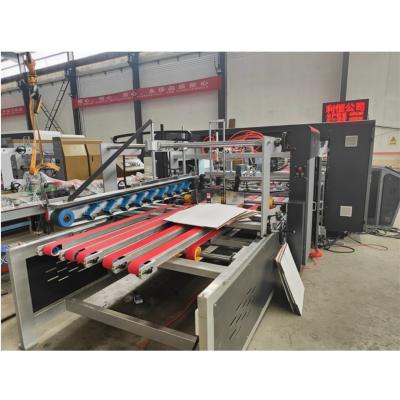 Cina 30-150 mm Distanza tra le unghie Distanza di precisione Personalizzazione Cartone cucitura Strapping Machine in vendita