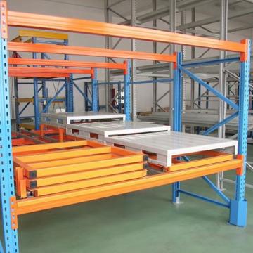 Close-up view of push back racking tracks and rollers