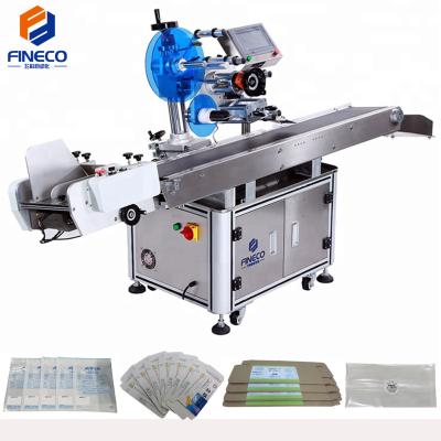 Cina FK812 CLOTHING Automatic Garment Sticker Bag Paper Label Flat Plastic Card Labeler Machine With After-sales Service The Automatic Driver in vendita