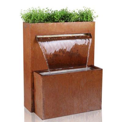 Cina Ornamenti d'acciaio multifunzionali del giardino del metallo della cascata di Corten con la piantatrice in vendita