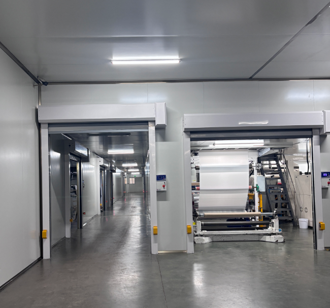 LU Reflective manufacturing facility producing DOT reflective tape rolls